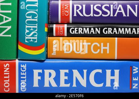 Various languages to English dictionaries Stock Photo - Alamy