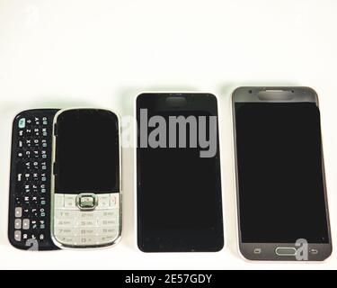 Three different types of mobile phones Stock Photo - Alamy