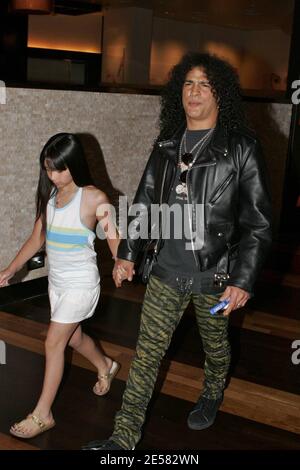 Exclusive!! Slash with daughter walking through The Palms casino after ...