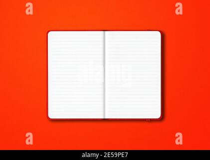 Red open lined notebook mockup with a pen isolated on concrete ...