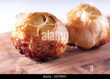 roasted garlic heads packed with flavor Stock Photo - Alamy