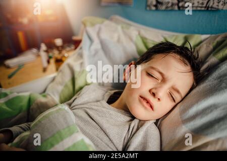 portrait of a sweating young boy Stock Photo - Alamy