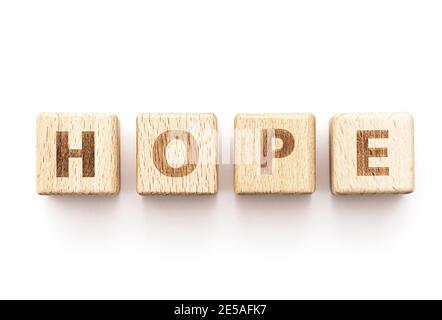 Faith, words on wooden cube blocks on dark brown wood background, close ...