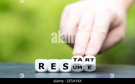 Restart and Resume symbol. Hand turns cubes and changes the word Resume ...