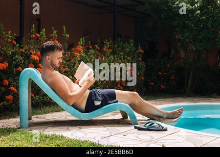 Man swimming in the swimming pool alone. Summer vacation Stock Photo ...