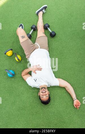 Handsome man with great body gym and pool Stock Photo - Alamy