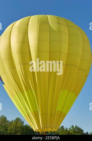 Hot air balloon lifting off Stock Photo - Alamy