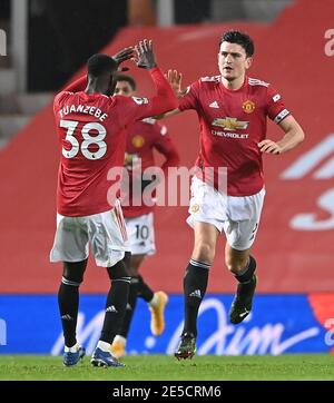 Manchester United's Harry Maguire (right) is dejected after losing the ...