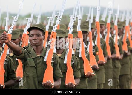 Ugandan soldiers of the Uganda People's Defence Force (UPDF) patrol ...