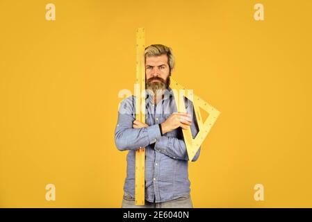 Find solution. Free education. Teaching geometry. Bearded man use ruler ...