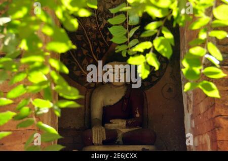 BAGAN, MYANMAR - NOVEMBER 18, 2015: Huge colored statue of Buddha in ...