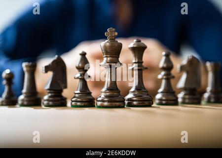 Success Business Strategy. Person With Chess King Stock Photo - Alamy