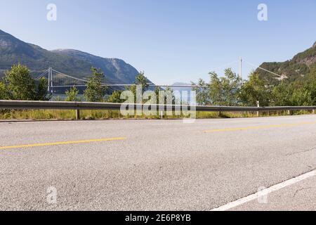 The great suspension bridge Hardangerbrua across the Eidfjorden in ...