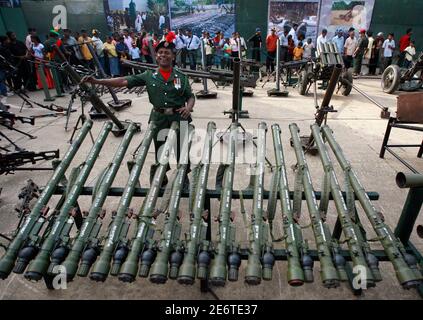 Sri Lanka: Liberation Tigers of Tamil Eelam (LTTE) soldiers examine ...