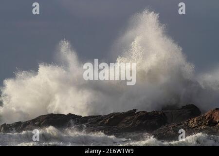 Storm on the coast seeig big wave breaking over rocks and cliffs seeing ...