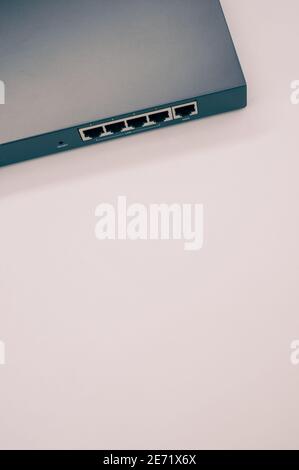 Vertical shot of the USB ports on an electronic on a beige surface ...