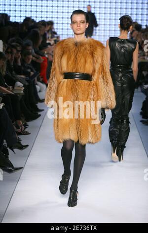 A model wears a creation for the Loewe fall-winter 22/23 men's ...
