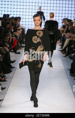 A model wears a creation for the Loewe fall-winter 22/23 men's ...