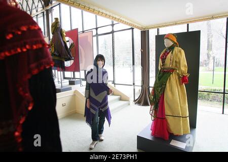An Iranian model wears an Islamic dress made by Iranian designers at a ...