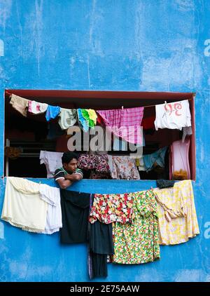 SRI LANKA Colombo, people live in slum, boy playing with kite Stock ...