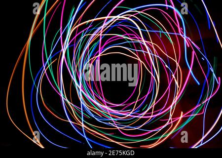 Multi color light painting photography, swirl and curve of blue, green ...