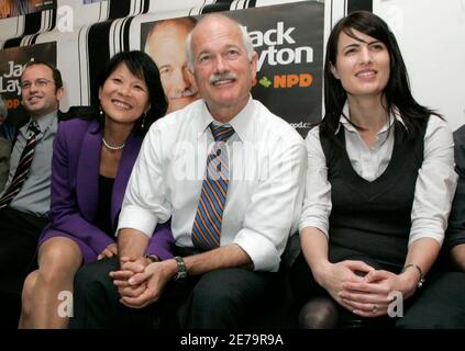 Jack Layton's wife Olivia Chow receives a feather from Shawn Atleo after he gave an Aboriginal ...