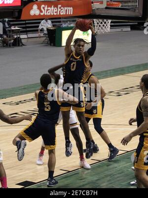 UC Irvine forward JC Butler (0) shoots during an NCAA college ...