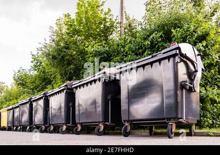 Garbage containers near apartment building in district garbage bins to ...