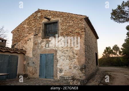 small brick house against blue sky Stock Photo - Alamy