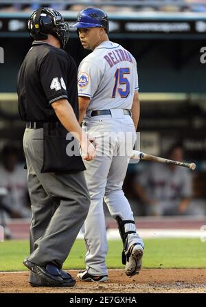 Home plate umpire Tim Tschida calls a strike for San Diego Padres Heath ...