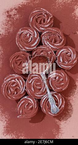 Delicate zephyr sprinkled with cocoa powder. Low-calorie marshmallows ...