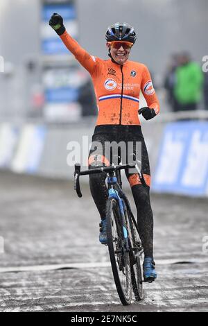 Dutch Lucinda Brand celebrates as she crosses the finish line to win ...