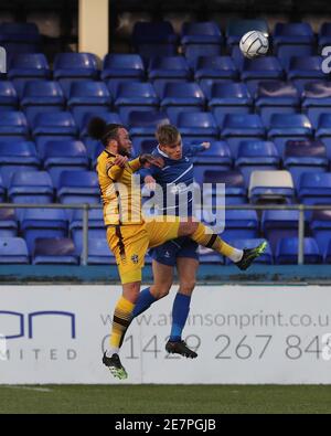 Hartlepool United's Lewis Cass contests a header with Weymouth's Jacob ...
