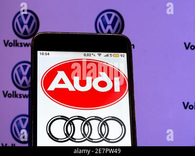 In this photo illustration, the Audi logo is seen displayed on a ...