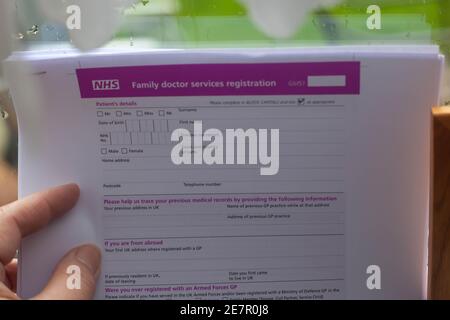 NHS family doctor services registration form Stock Photo - Alamy