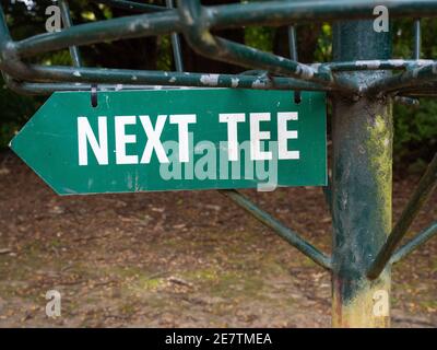 NEXT TEE sign with arrow at golf course Stock Photo - Alamy