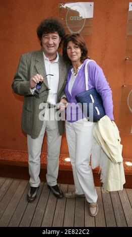 Canadian singer Robert Charlebois and wife arriving at the premiere of ...