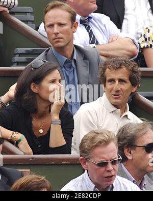 Formula One legend Alain Prost and wife attends at the quarter-final of ...