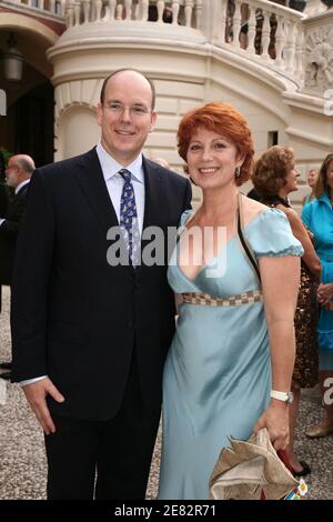 Prince Albert II of Monaco poses with Fred Lajoux in the paddock of the ...