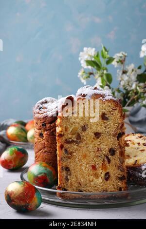 Cut Easter cake and dyed eggs Stock Photo - Alamy