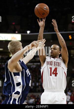 Ohio State's Jamar Butler (14) goes to the basket for two as Purdue's ...