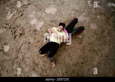 Two women mud wrestling at a mud fighting competition at The LowLand ...