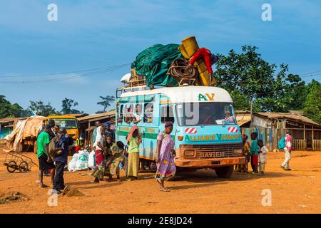 Fully loaded local bus in Libongo, deep in the jungle of Cameroon Stock ...