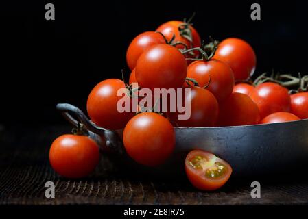 Cherry tomatoes in shell, Solanum lycopersicum Stock Photo - Alamy