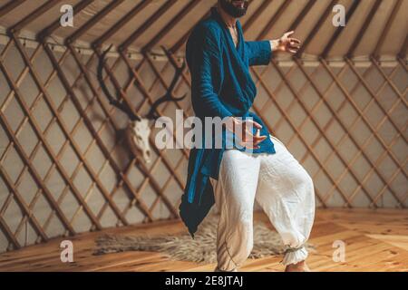 dancing warrior, ceremonial dance in a yurt Stock Photo - Alamy