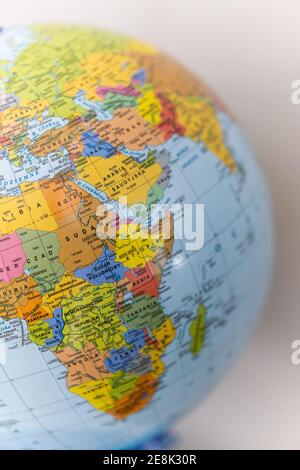A vertical closeup shot of rotary world globe model Stock Photo - Alamy
