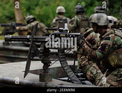 US Navy SEALs during water training at sunrise October 21, 2009 in ...