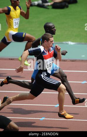 UK's Craig Pickering and Bahamas' Derrick Atkins compete on men's 100 ...