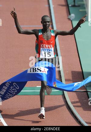 OSAKA, Japan - Kenya's Luke Kibet crosses the finish line to win the ...