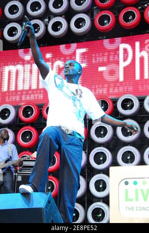 Rapper Akon performs onstage during the Live Earth - New York concert ...